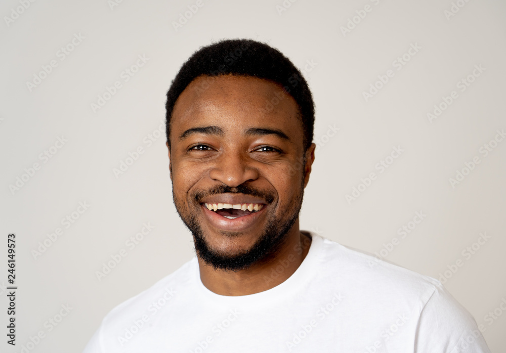 Close up portrait of smiling and laughing attractive man in happy ...